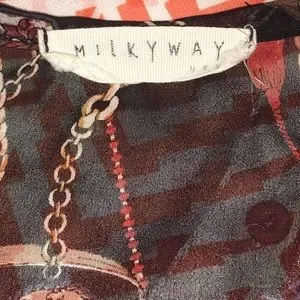 Milky Way | Tops | Clearance Milky Way Asymmetrical Sheer Bridle Bit ...
